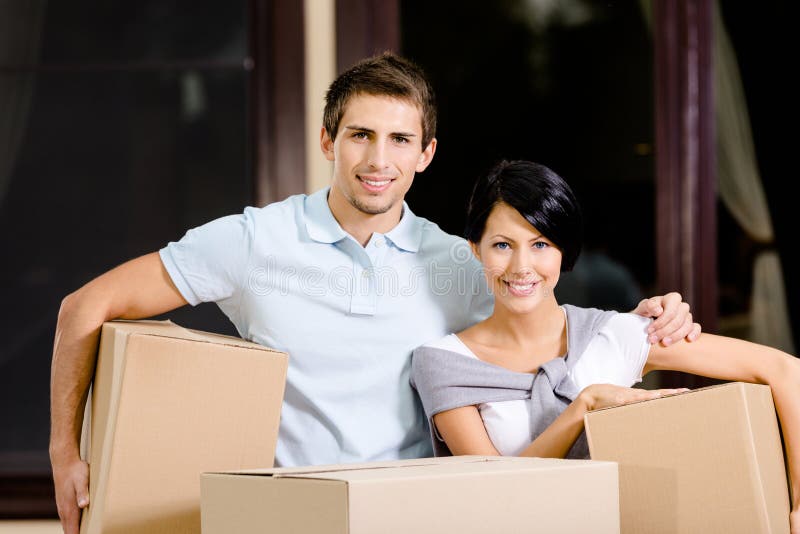 Happy Couple Carrying Pasteboard Containers Stock Image - Image of ...