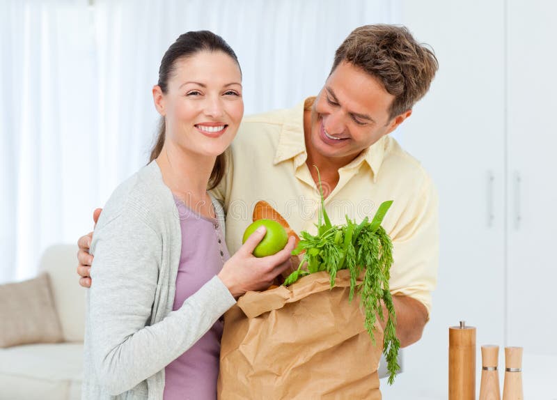Happy Couple Coming Back from the Market Stock Photo - Image of ...