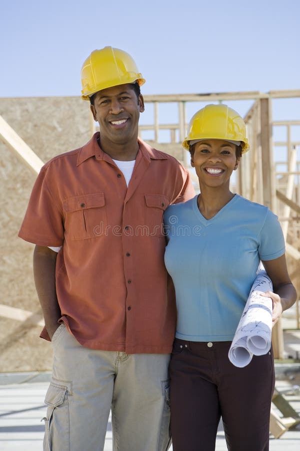 Happy Couple at Construction Site Stock Photo - Image of ethnicity ...