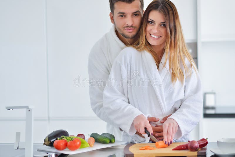 Happy Couple Cooking Breakfast Together in the Kitchen Stock Photo ...