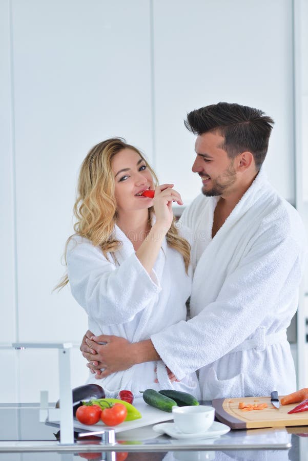 Happy Couple Cooking Breakfast Together in the Kitchen Stock Photo ...