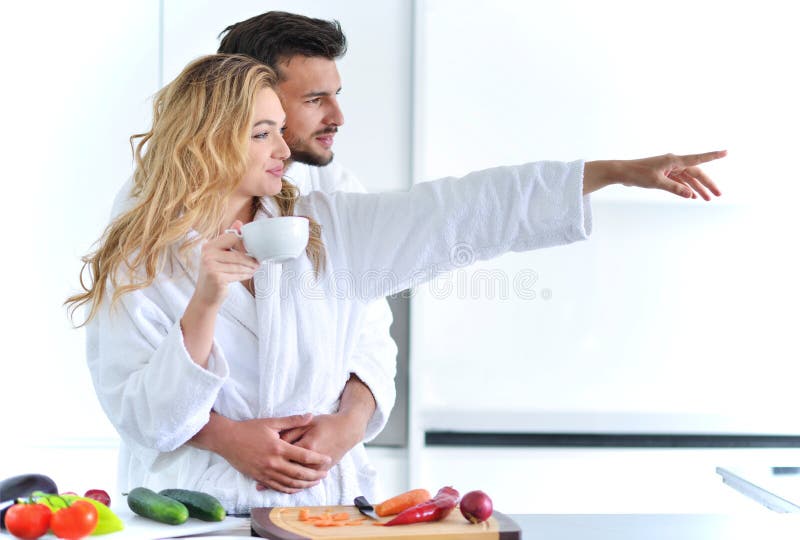 Happy Couple Cooking Breakfast Together in the Kitchen Stock Photo ...