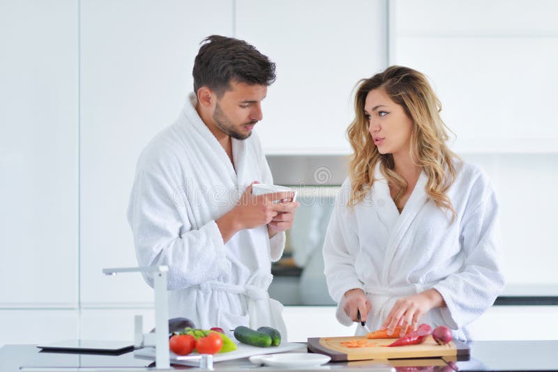 Happy Couple Cooking Breakfast Together in the Kitchen Stock Photo ...