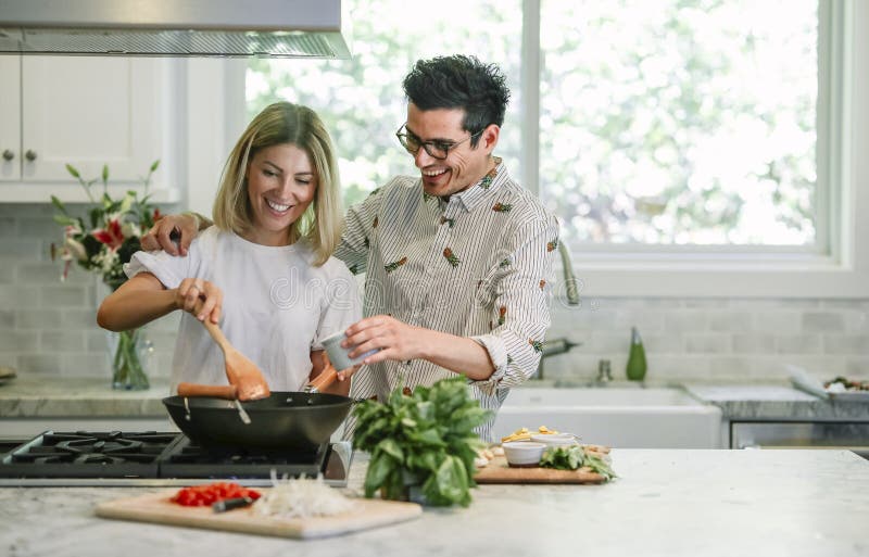 Happy Couple Cooking in the Kitchen Stock Photo - Image of home, happy ...