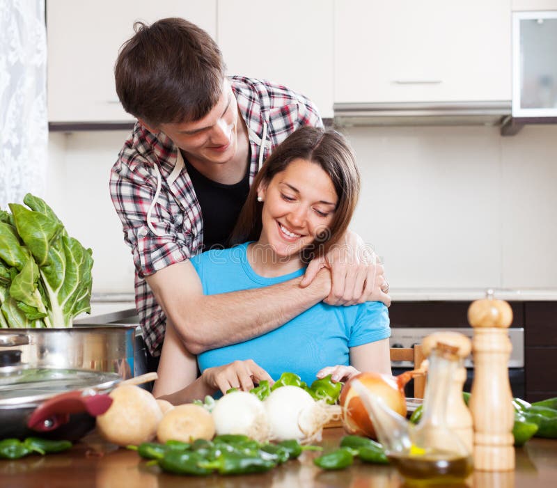 Happy Couple Cooking Together Stock Photo - Image of girl, male: 29212624