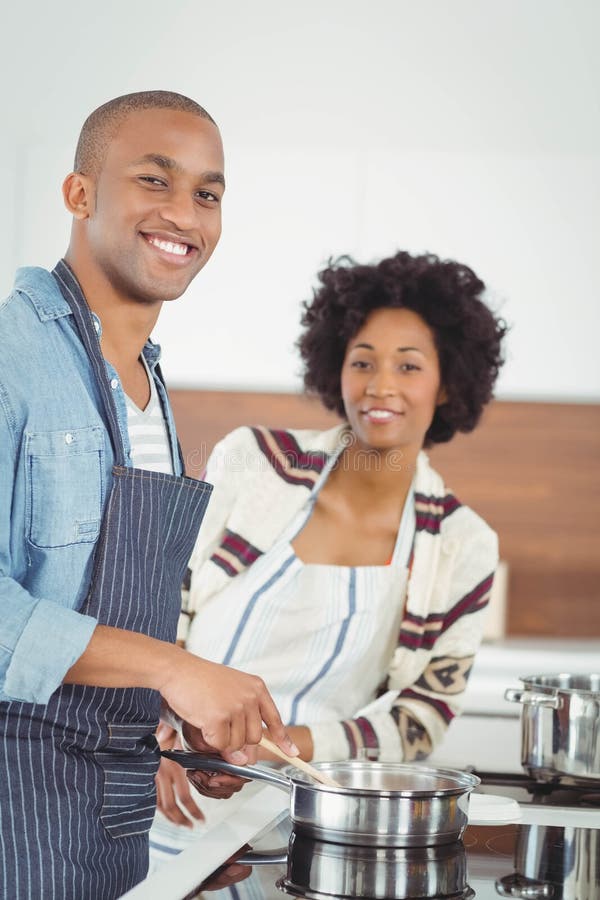 Happy Couple Cooking Together Stock Image - Image of household, home ...