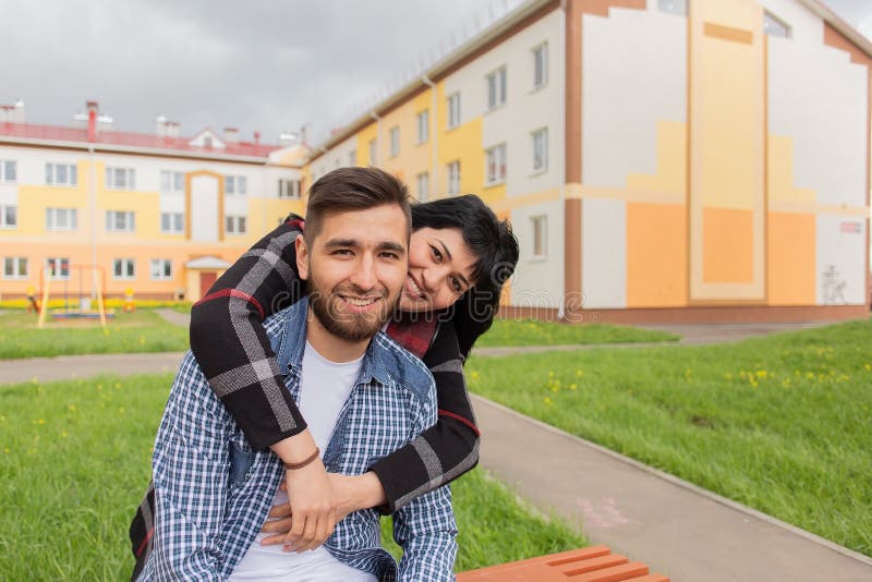 Happy Couple Cuddles in the Street Stock Image - Image of affection ...