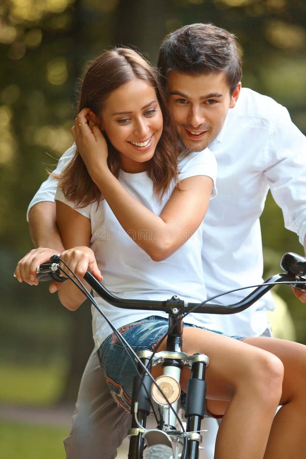 Happy Couple Cycling in the Summer Park Stock Image - Image of activity ...