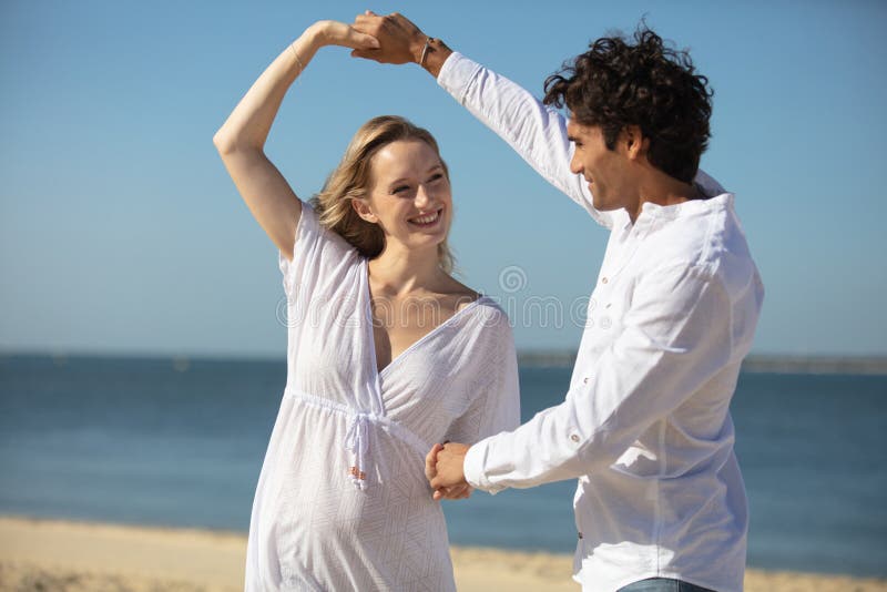 Happy Couple Dancing at Beach Stock Image - Image of young, nature ...