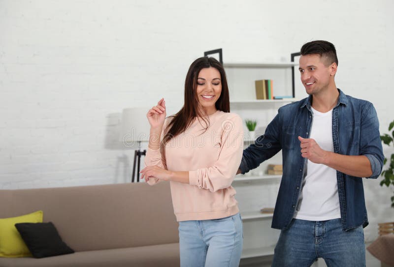 Happy Couple Dancing in Living Room Stock Photo - Image of home, grace ...