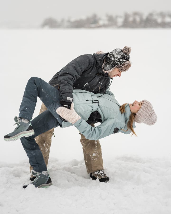 Happy Couple Dancing Together in Snow in Winer Stock Image - Image of ...