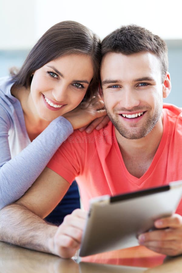 Happy Couple with Digital Tablet Stock Photo - Image of lifestyle ...