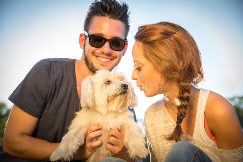 Happy Couple with Dog during Autumn Stock Photo - Image of young ...