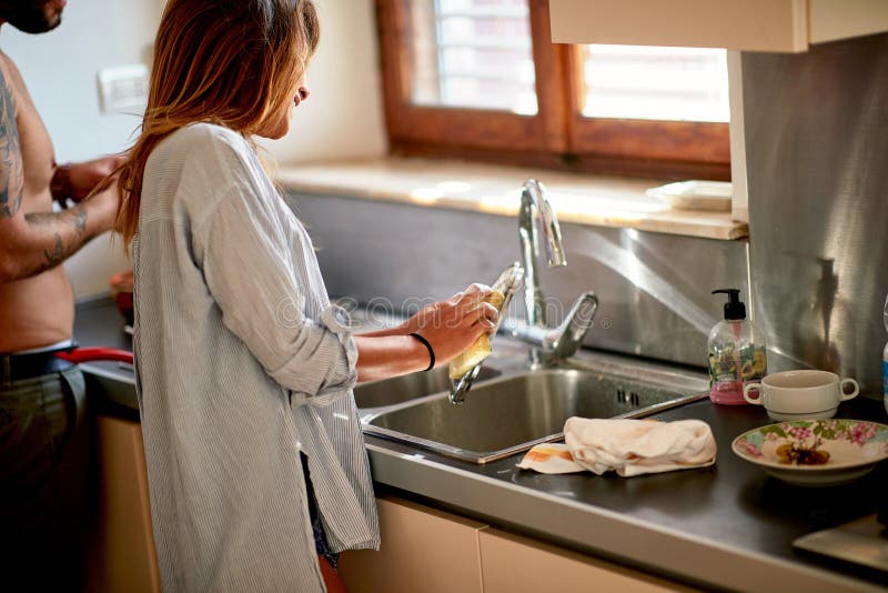 Happy Couple Doing the Dishes Together Stock Photo - Image of diligent ...
