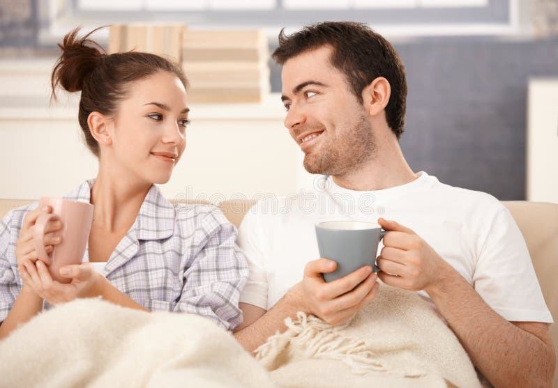 Happy Couple Drinking Tea in Bed Smiling Stock Photo - Image of ...