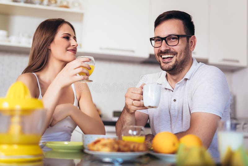 Couple Enjoying Breakfast Time Together at Home Stock Image - Image of ...