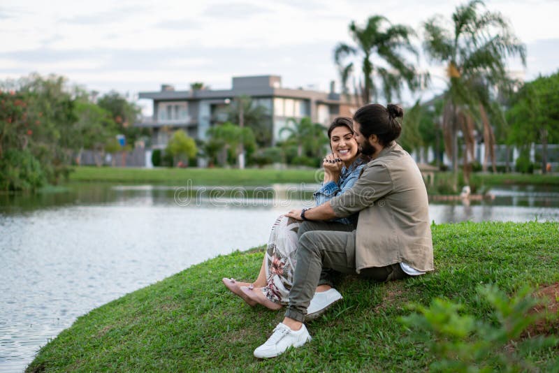 Couple Enjoying Weekend and Bonding in Afternoon in Front of Lake Stock ...