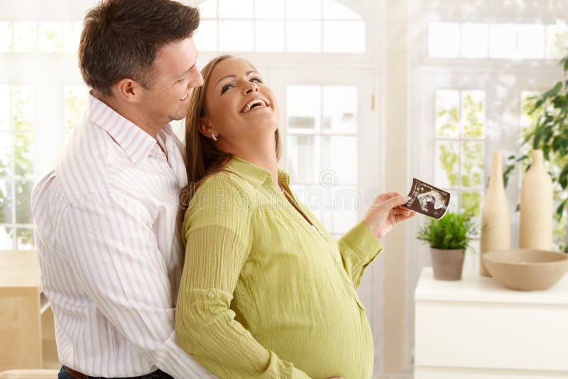 Happy Expecting Couple in Baby S Room Stock Photo - Image of brunette ...