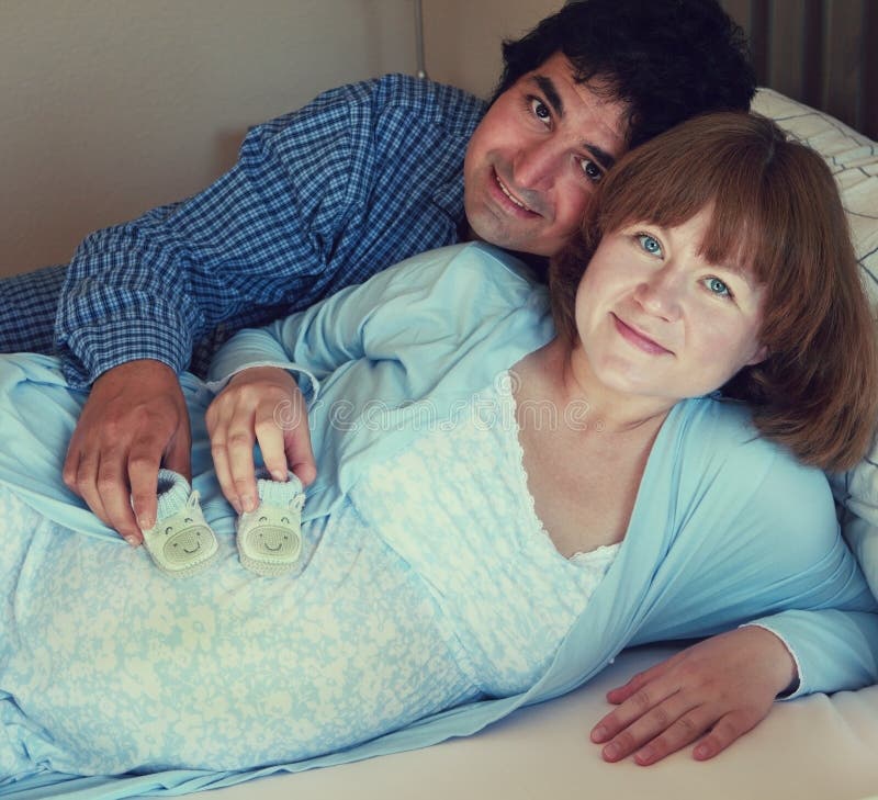 Happy Couple Expecting Baby Stock Photo - Image of clothes, maternity ...
