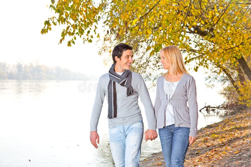 Happy Couple in Fall Under Leaves Stock Photo - Image of couple, male ...