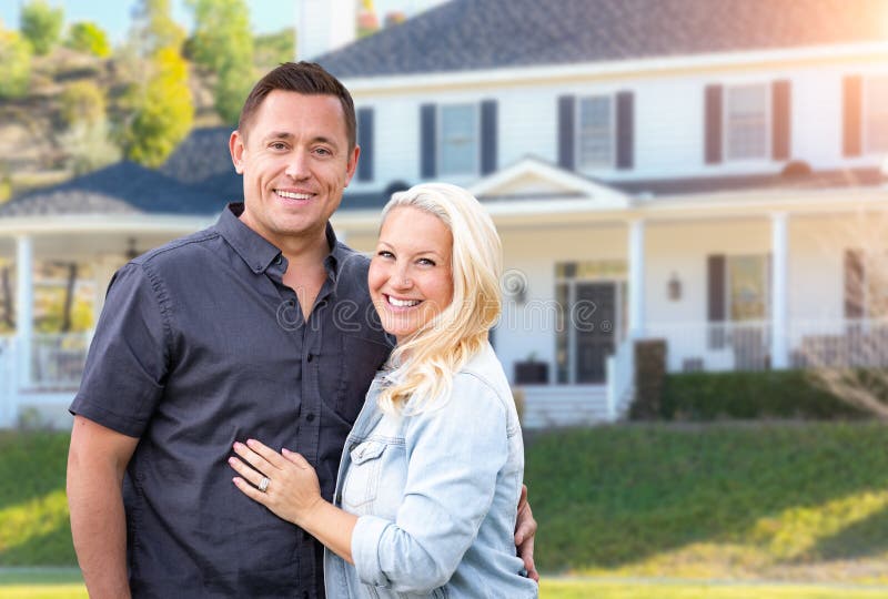 Happy Couple in Front of Beautiful House Stock Image - Image of outside ...