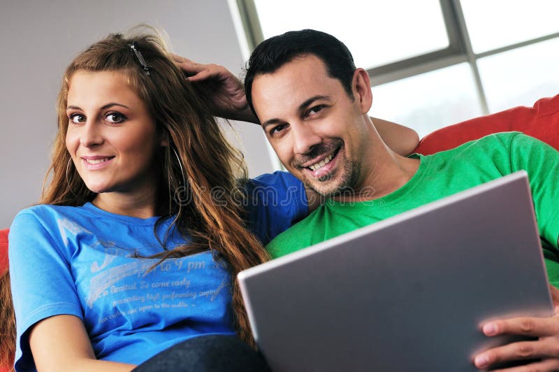 Happy Couple Have Fun and Work on Laptop at Home Stock Image - Image of ...