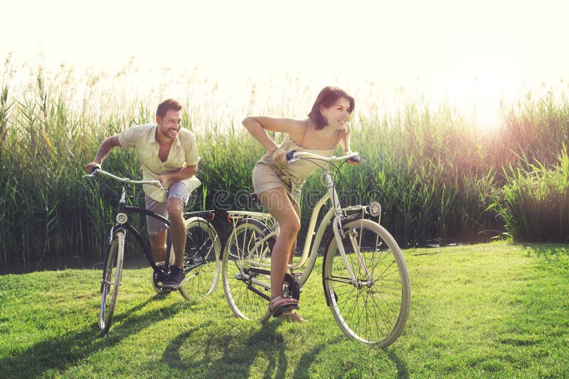 Couple Having a Bicycles Race into the Nature in Garda Lake Stock Image ...