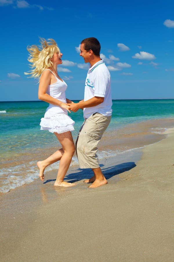 Happy Couple Having Fun on the Beach Stock Image - Image of lover, cute ...