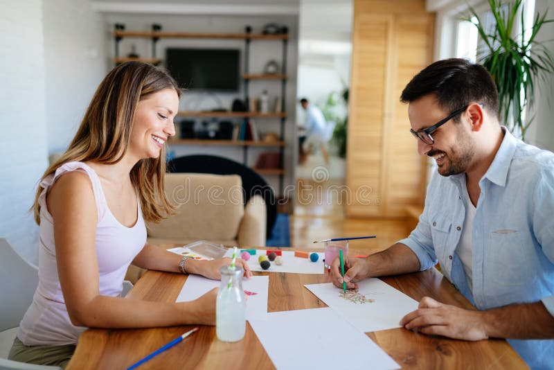 Happy Couple Having Fun Drawing at Home Stock Photo - Image of color ...