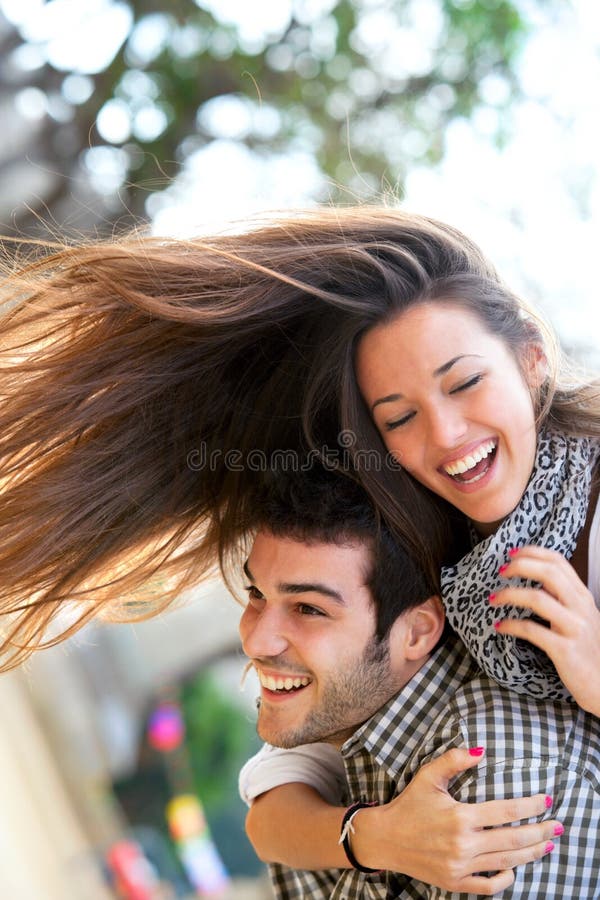 Happy couple jumping high stock photo. Image of fashion - 24041830