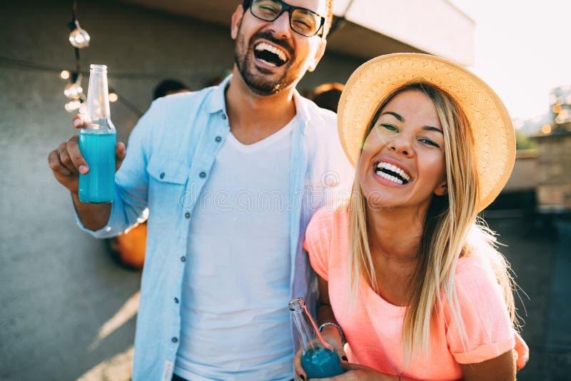 Happy Couple Having Fun Time at Party Stock Photo - Image of drink ...