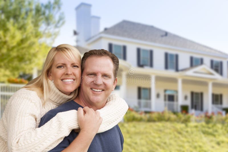 Happy Couple Hugging in Front of House Stock Image - Image of living ...