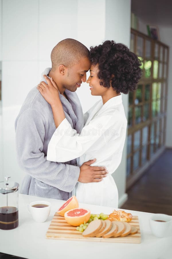 Happy Couple Hugging in the Kitchen Stock Photo - Image of bath ...