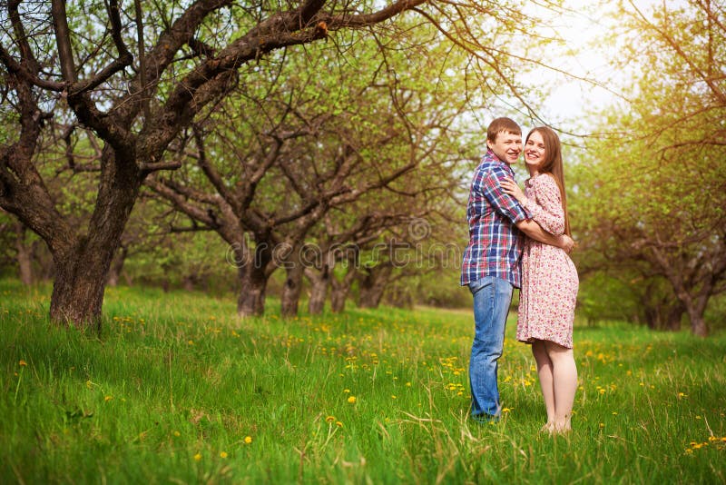 Happy Couple are Hugging on a Spring Meadow Stock Image - Image of ...