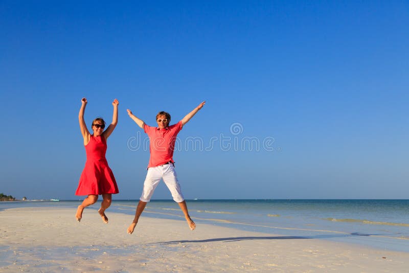 Happy Couple Relax on a Tropical Beach Stock Photo - Image of couple ...