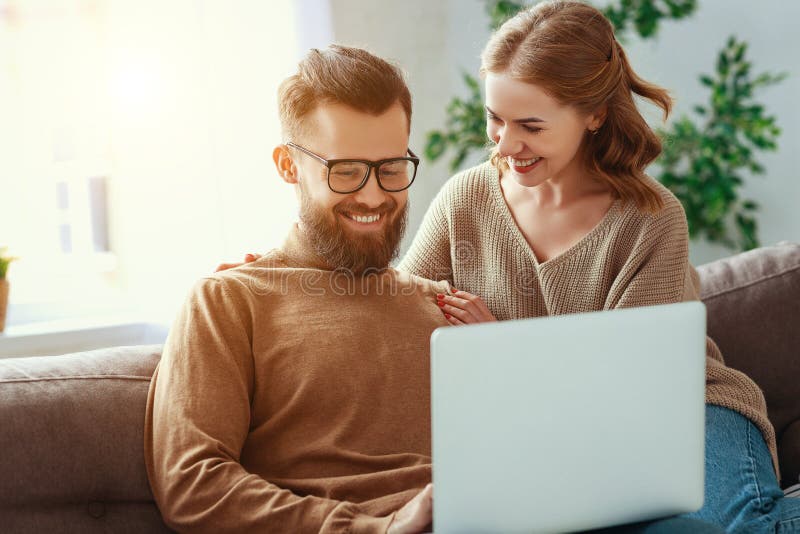 Happy Couple with Laptop Computer at Home Stock Image - Image of couple ...