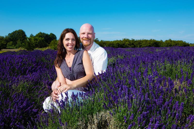 Happy Couple in Lavender stock photo. Image of colorful - 25922622