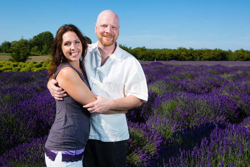 Happy Couple in Lavender stock image. Image of aromatic - 25922639
