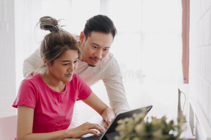 Happy Couple Looking at the Advertisement Service Offer in the Internet ...
