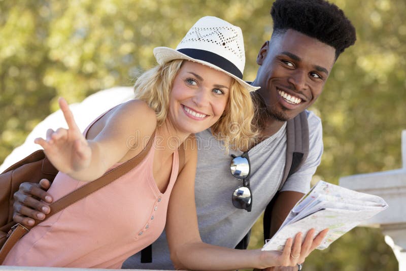 Happy Couple Looking at Map while on Summer Holiday Stock Image - Image of happiness, trees ...