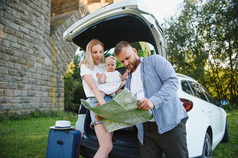 Happy Couple Looking at the Map. Travel Concept Stock Image - Image of ...