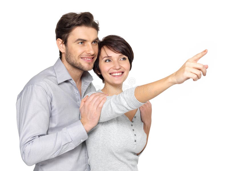 Happy Couple Looking and Pointing into the Distance Stock Photo - Image ...