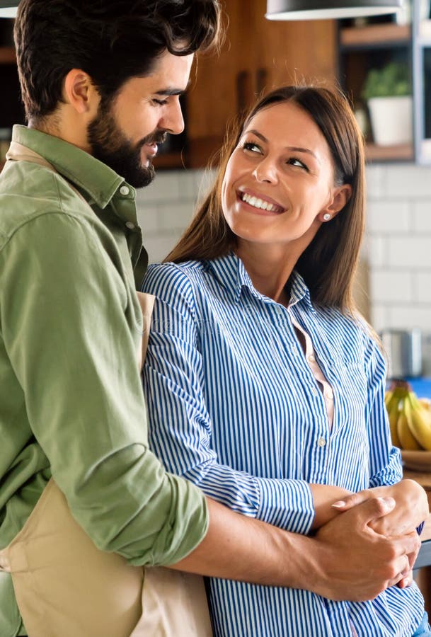 Happy Couple in Love Bonding and Hugging at Home Stock Photo - Image of ...