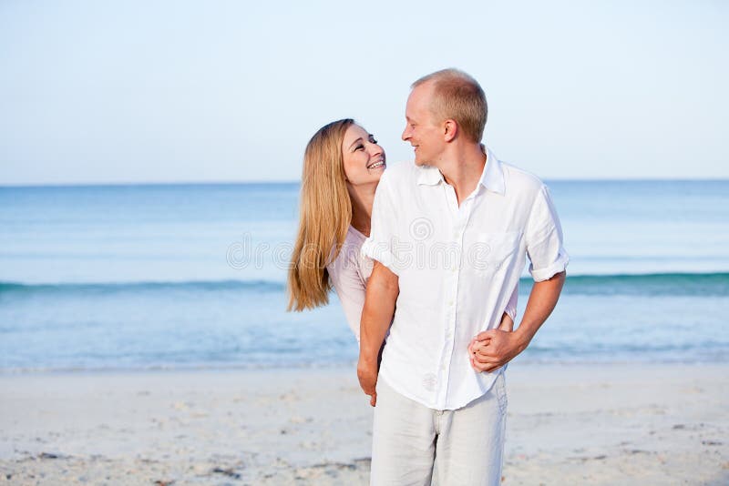 Happy Couple in Love Having Fun on the Beach Stock Photo - Image of ...