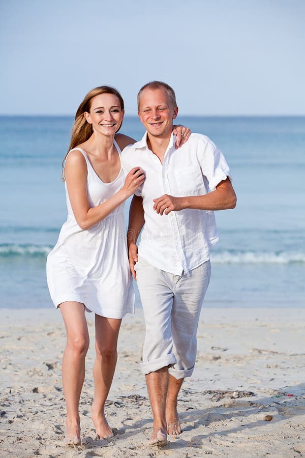 Happy Couple in Love Having Fun on the Beach Stock Photo - Image of ...
