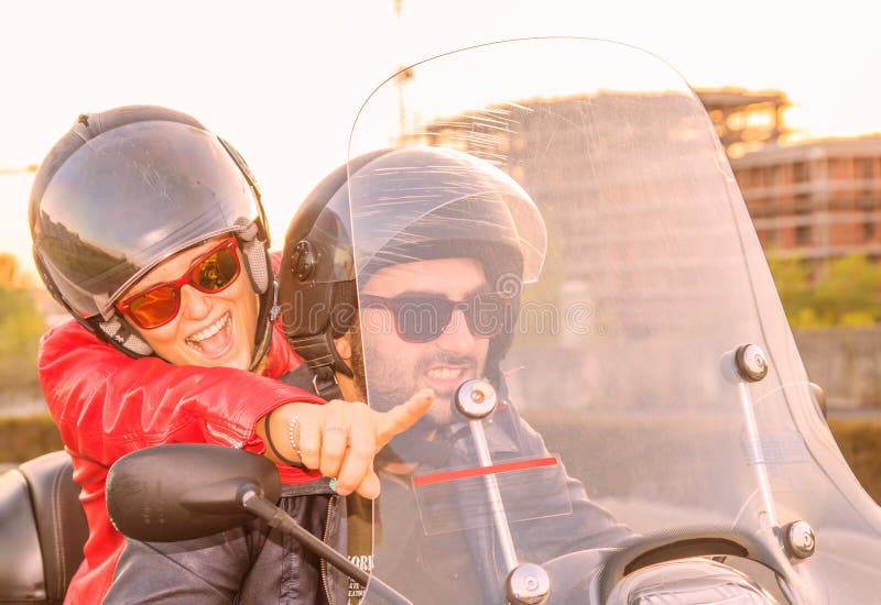 Happy Couple in Love Riding Scooter Together Stock Photo - Image of ...