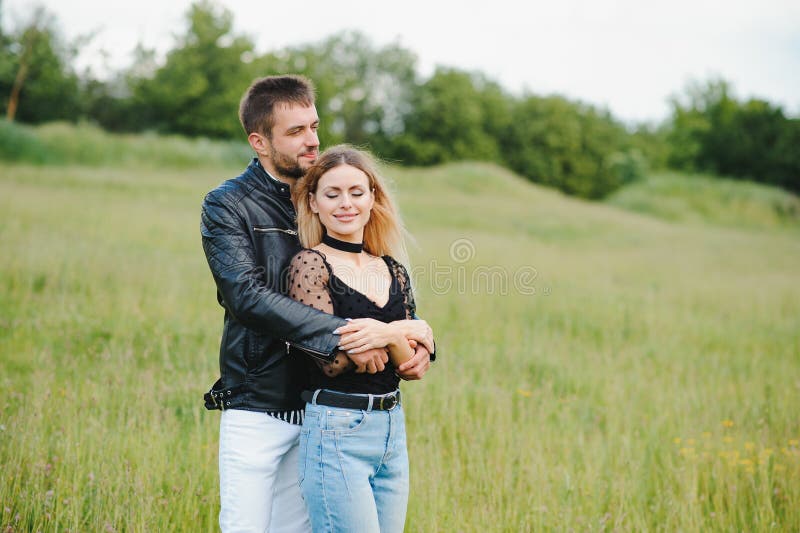 Happy Couple in Love at Sunset and Smiling Stock Photo - Image of ...