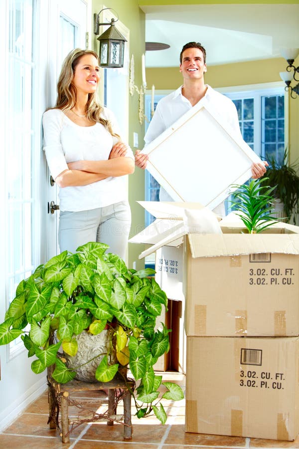 Happy Couple Moving in a New House. Stock Image - Image of packaging ...
