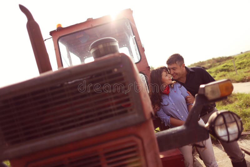 Happy Couple Near Tractor Farm Stock Photos - Free & Royalty-Free Stock ...
