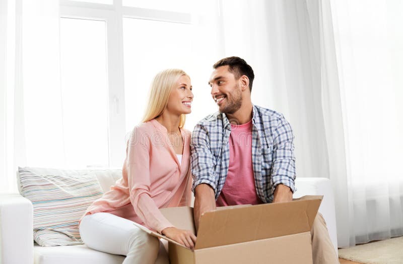 Happy Couple with Open Parcel Box at Home Stock Image - Image of post ...